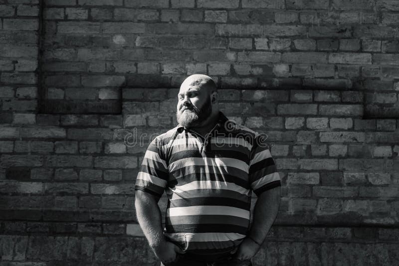 Fat Man in the Park Looks into the Frame, a Portrait of a Man with ...