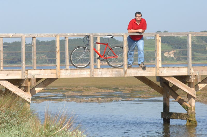 Fat Man Resting Over Bridge Looking To Landscape Stock Photos - Free ...