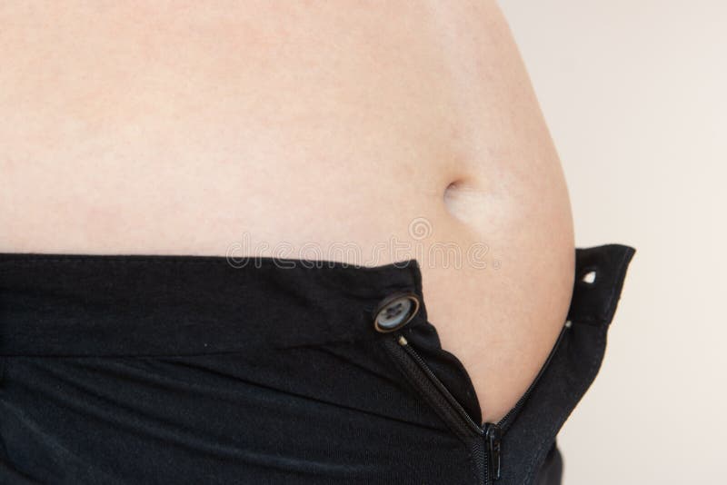 The Fat Man`s Belly Does Not Fit in His Pants Stock Photo - Image of ...