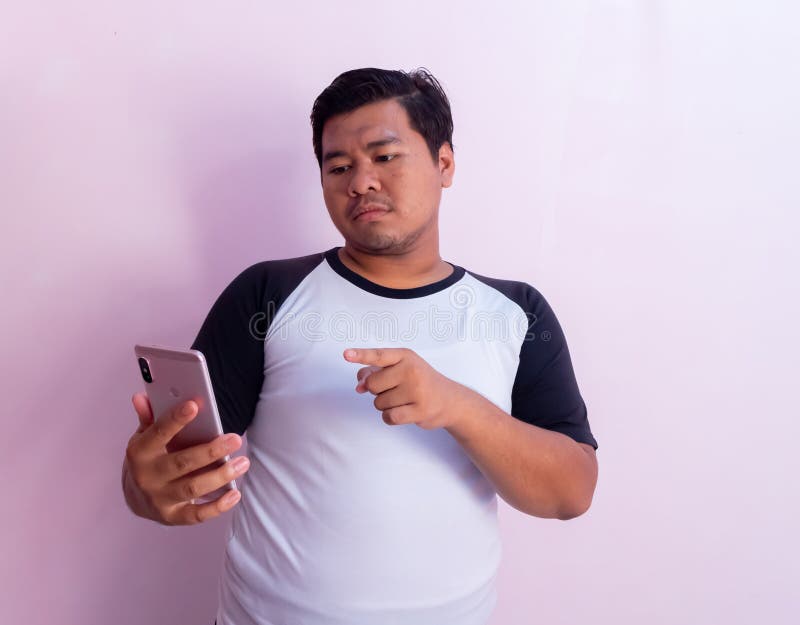 FAT MAN SEE a HANDPHONE with EXCITED EXPRESSION Stock Photo - Image of ...