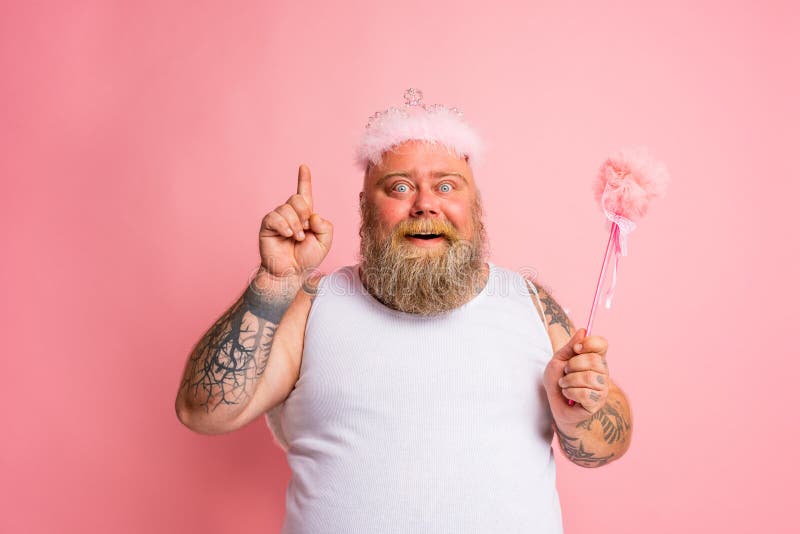 Fat Man with Tattoos and Beard Acts Like a Magic Fairy Stock Image ...