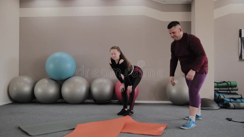Fat Man Woman Train in Gym Together. Stock Video - Video of people ...