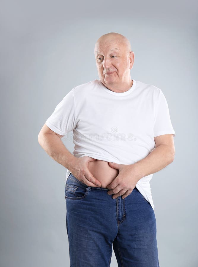 Fat Senior Man on Grey Background. Stock Image - Image of oversized ...