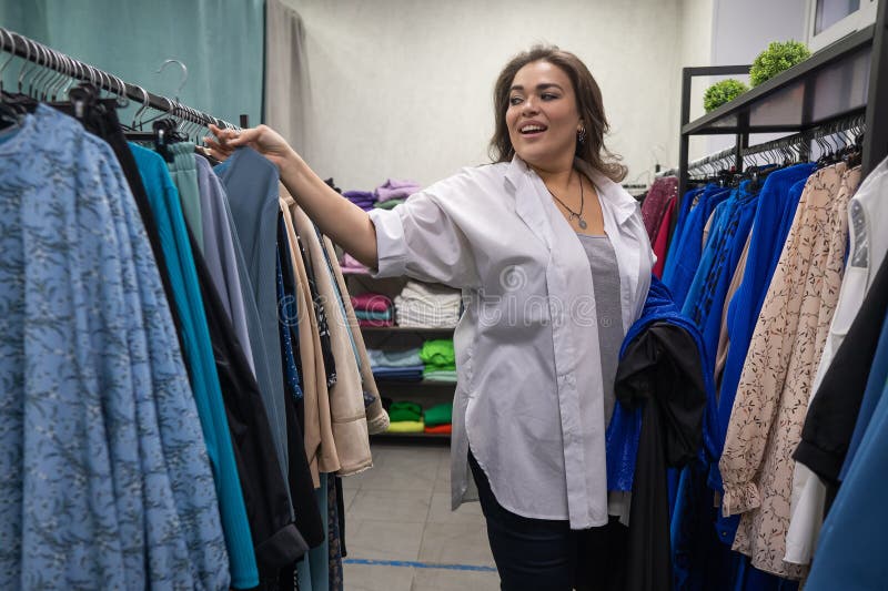 Smiling Fat Woman in Plus Size Store Looking at Camera. Stock Image ...
