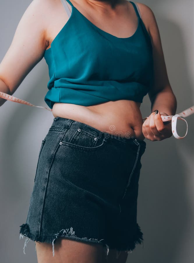 Fat Woman Fat Belly Chubby Obese Woman Hand Holding Excessive Belly Fat With Measure Tape