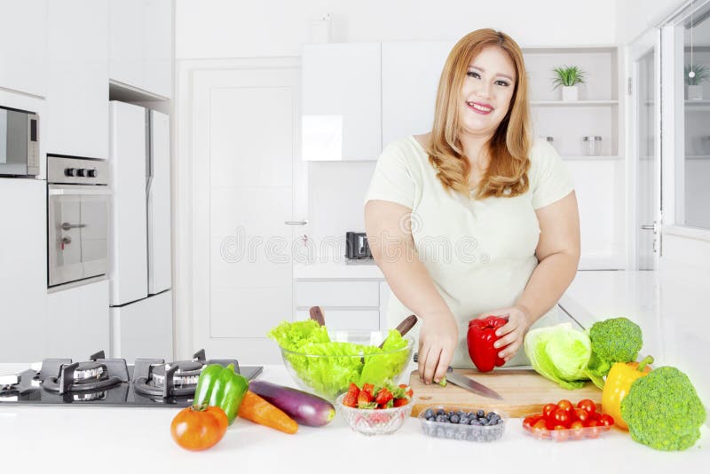 Fat Woman Making Salad with Vegetable Stock Photo - Image of cabbage ...