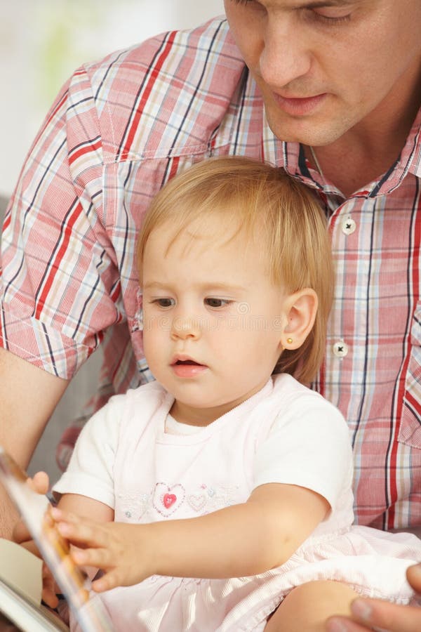 Father And Baby Reading Book Stock Photo - Image of girl, adult: 22664862