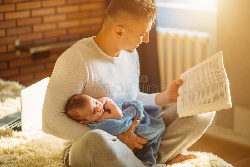 Young Father and Reading Book To Little Baby Stock Image - Image of ...