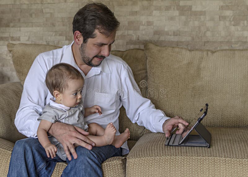 Father with Baby Son Using Tablet Pc Stock Image - Image of infants ...