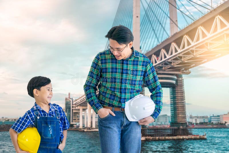 Father Builder and Son Walking Together in Modern City Bridge for ...