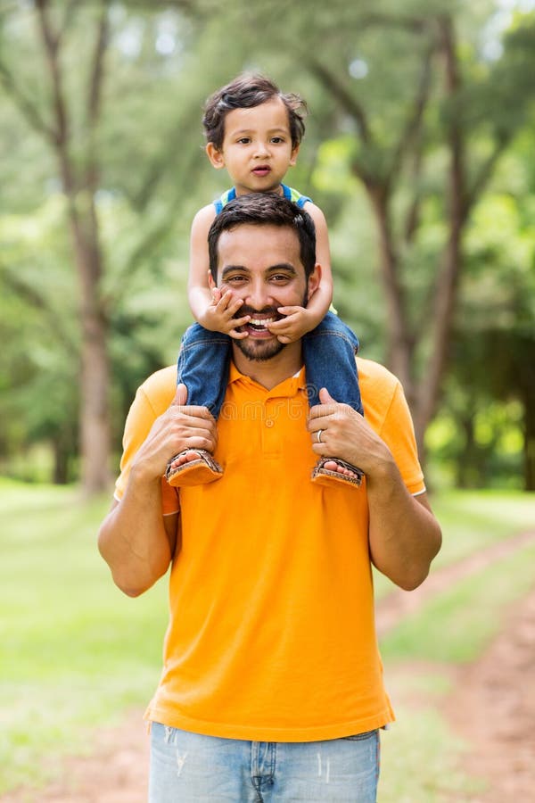 Father carrying son stock photo. Image of people, happy - 39597618