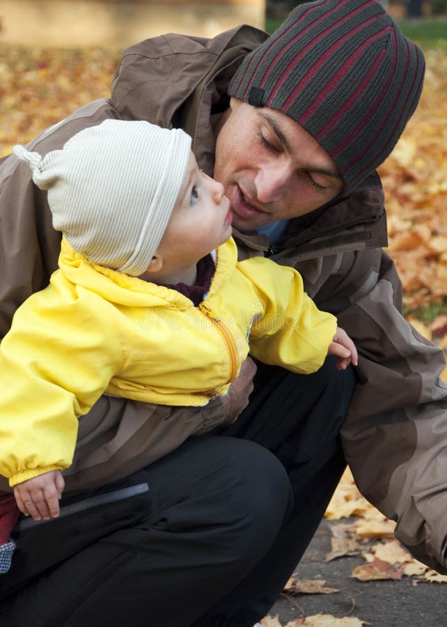 Father with child stock image. Image of teach, park, crouch - 11531347