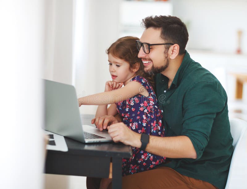 Father and Daughter Working at a Computer at Home Stock Photo - Image ...