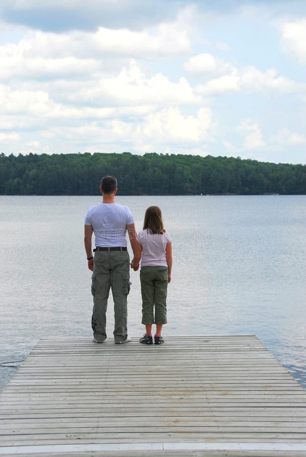 Father child lake stock image. Image of look, nature, people - 997557