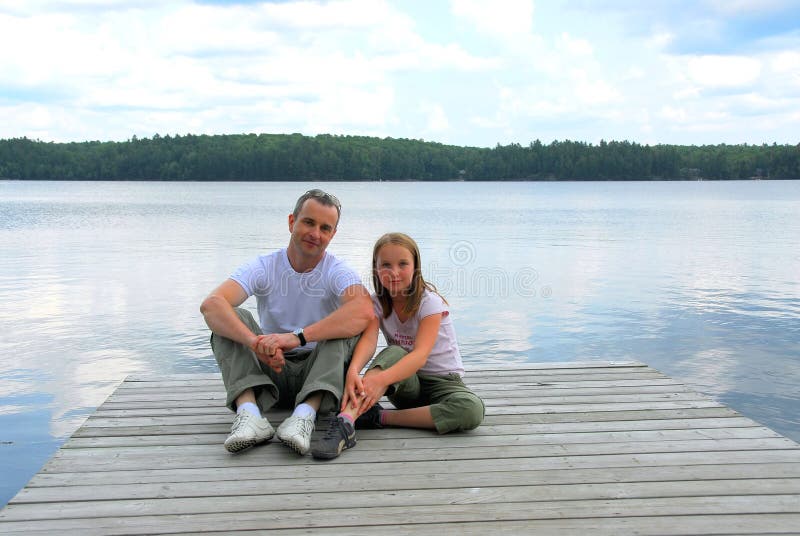 Father and Son at the Lake stock photo. Image of funny - 102642238