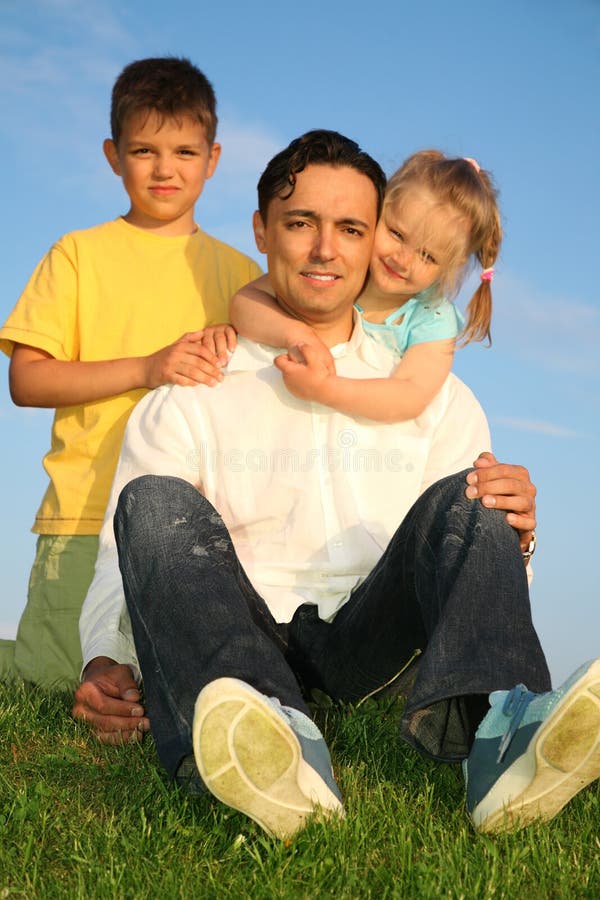 Father with children stock photo. Image of action, meadow - 2557806