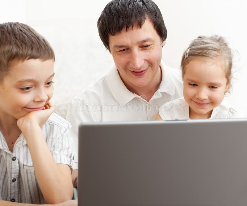 Father with Children Looking Laptop Stock Image - Image of father, play ...