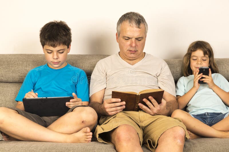 Father and Children Sitting on the Sofa Stock Image - Image of child ...