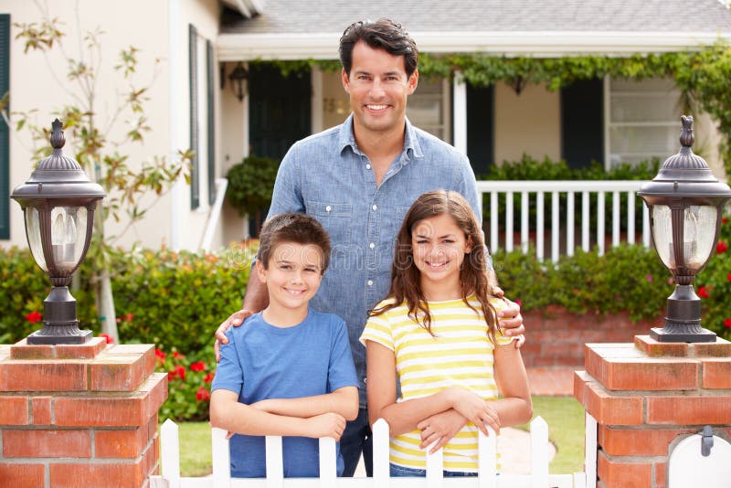 Father and Children Standing Outside Home Stock Image - Image of camera ...
