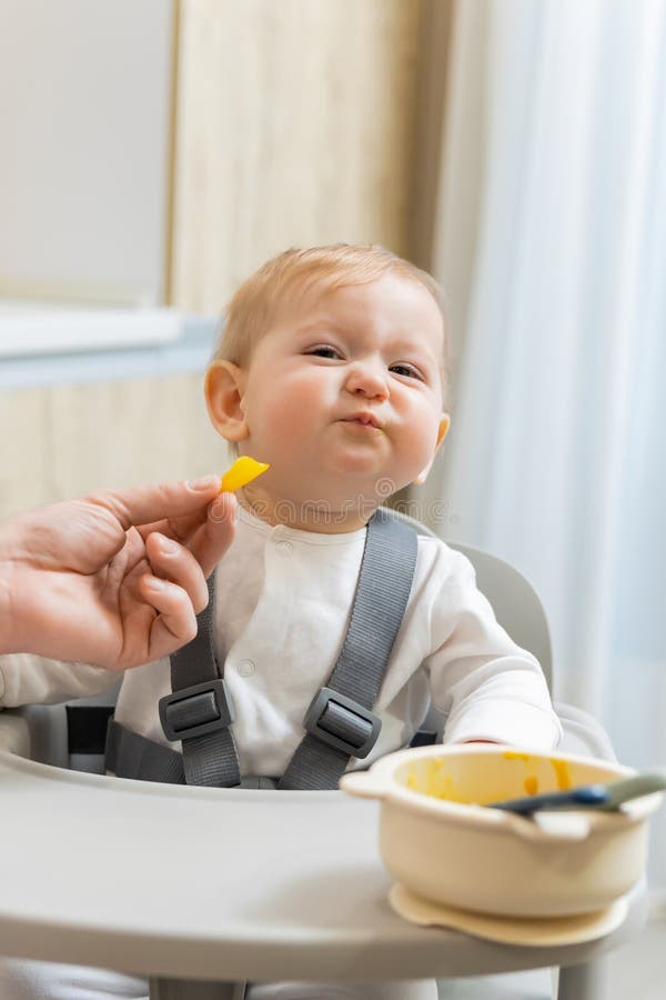 Father and a Cute Little Baby Boy Having Breakfast in the Kitchen Stock ...