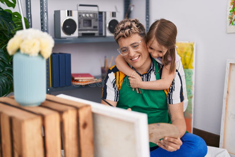 Father and Daughter Artists Hugging Each Other Drawing at Art Studio ...