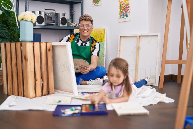 Father and Daughter Artists Smiling Confident Drawing at Art Studio ...
