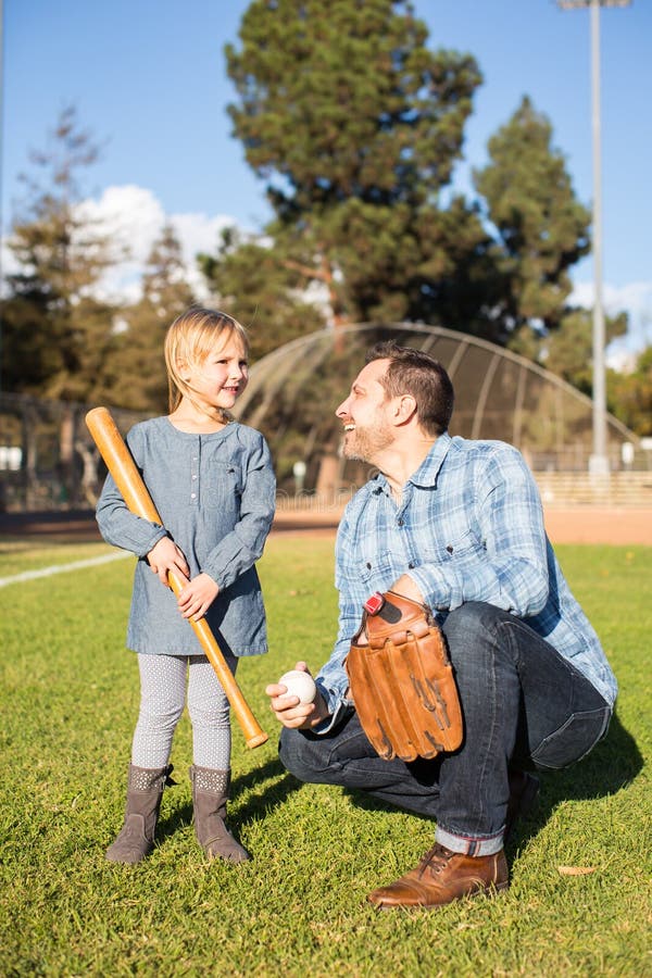 Father daughter baseball stock image. Image of cheerful - 141137287