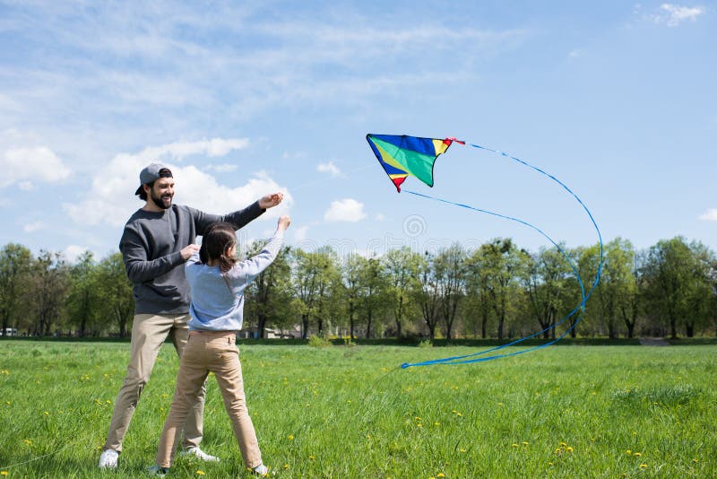 Father and Daughter Flying Kite Stock Image - Image of outside ...