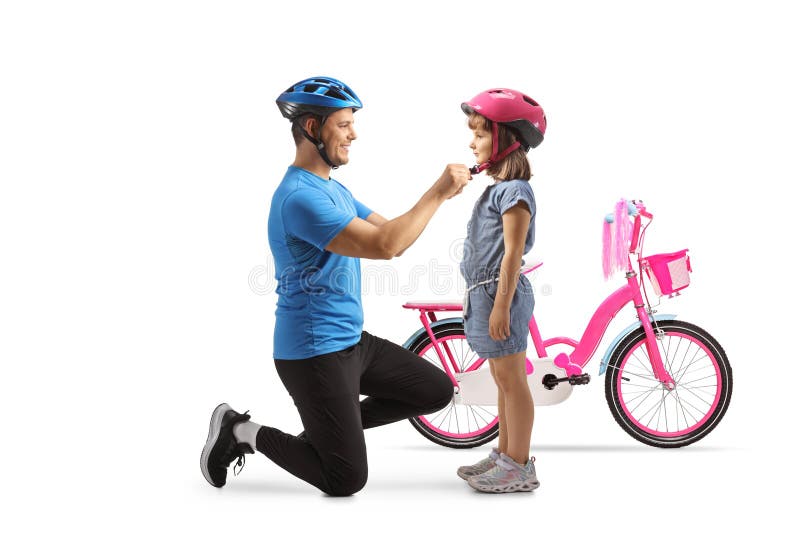 Father and Daughter Getting Ready for a Bicycle Ride and Putting ...