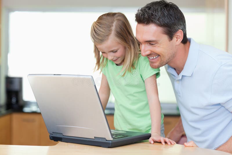 Father and Daughter with Laptop Stock Image - Image of relaxing ...