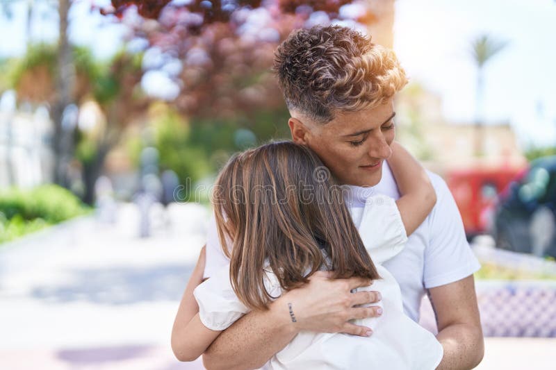 Father and Daughter Smiling Confident Hugging Each Other at Park Stock ...