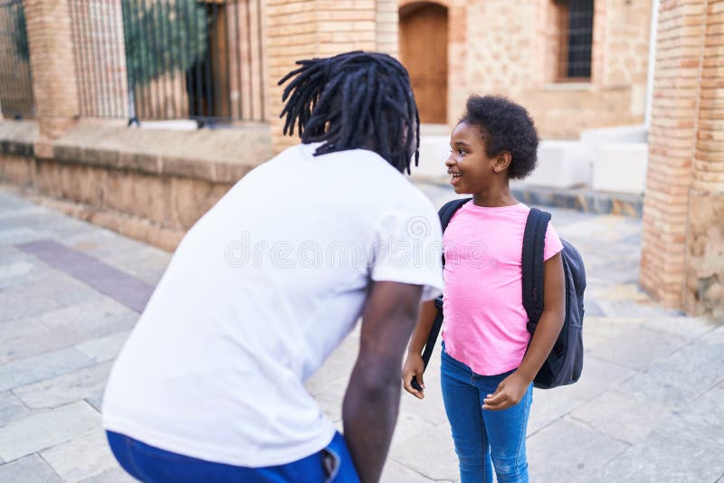 Father and Daughter Standing Together Speaking at School Stock Image ...
