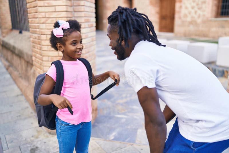 Father and Daughter Standing Together Speaking at School Stock Image ...
