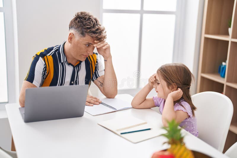 Father and Daughter Father and Daughter Stressed Using Laptop Studying ...