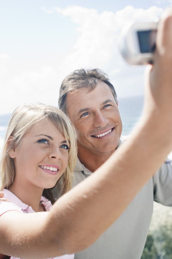 Father and Daughter Taking Self-Portrait Stock Photo - Image of ...