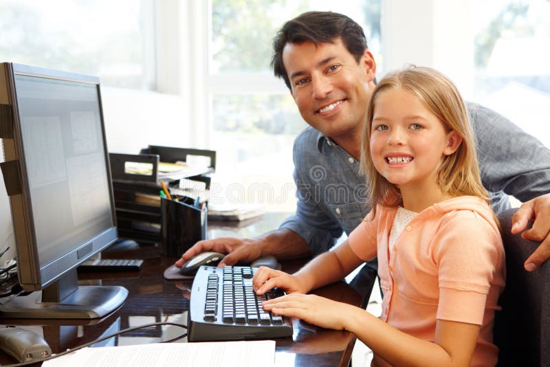 Father and Daughter Using Computer in Home Office Stock Photo - Image ...