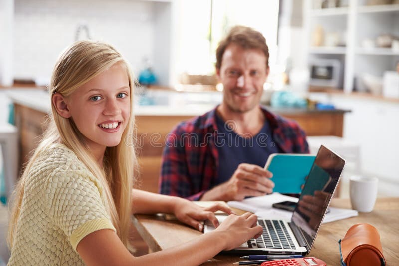 Father and Daughter Using Laptop Computer at Home Stock Photo - Image ...