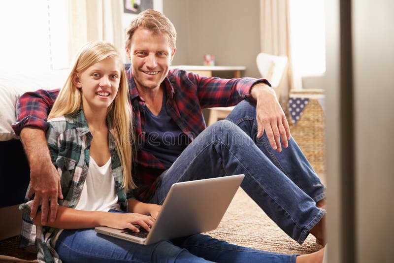 Father and Daughter Using Laptop Computer Together at Home Stock Image ...