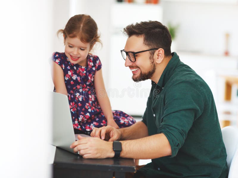 Father and Daughter Working at a Computer at Home Stock Photo - Image ...