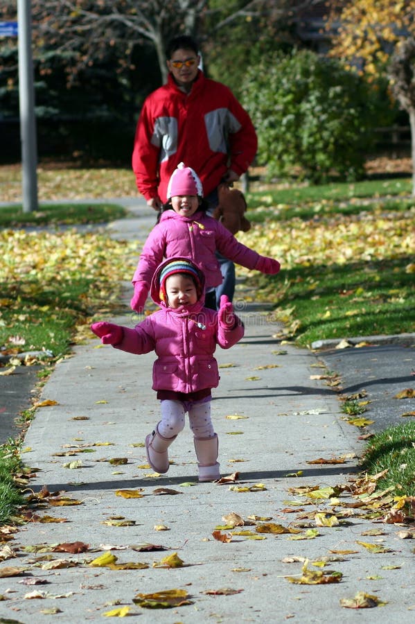 Father and Daughters Walking Stock Image - Image of brisk, cold: 6936741