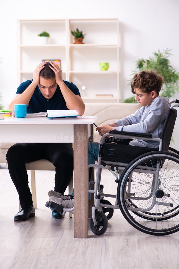 Father and Disabled Son in Education Concept Stock Image - Image of ...