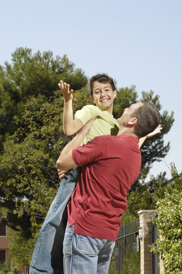 Father embrace son stock image. Image of european, urban - 8726753