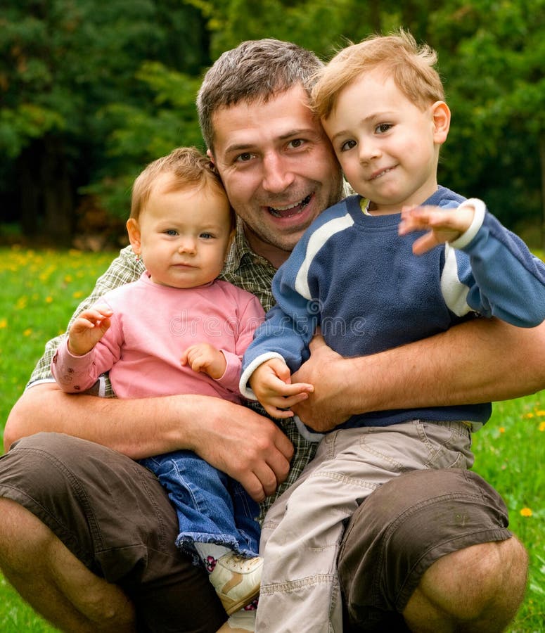 Father embracing children stock photo. Image of love, parental - 6219552