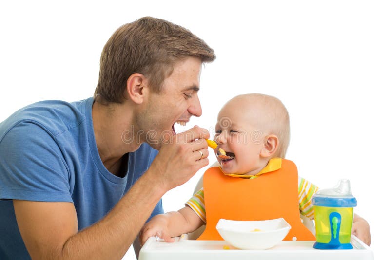 Father feeding baby son stock photo. Image of funny, beautiful - 44531088