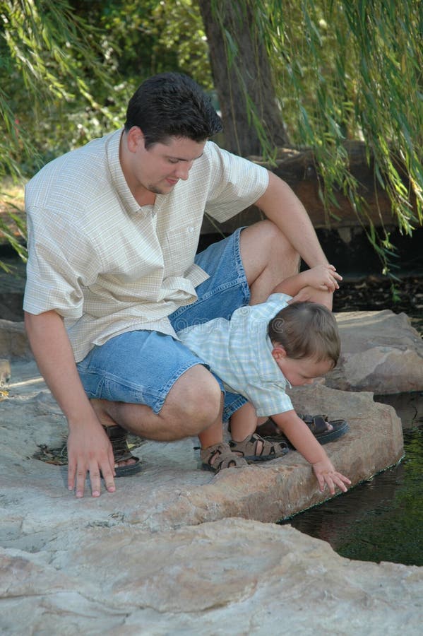 Father and Son stock photo. Image of life, activity, dock - 1564966