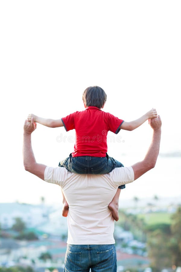 Father Giving Son Piggyback Ride Stock Image - Image of father, family ...
