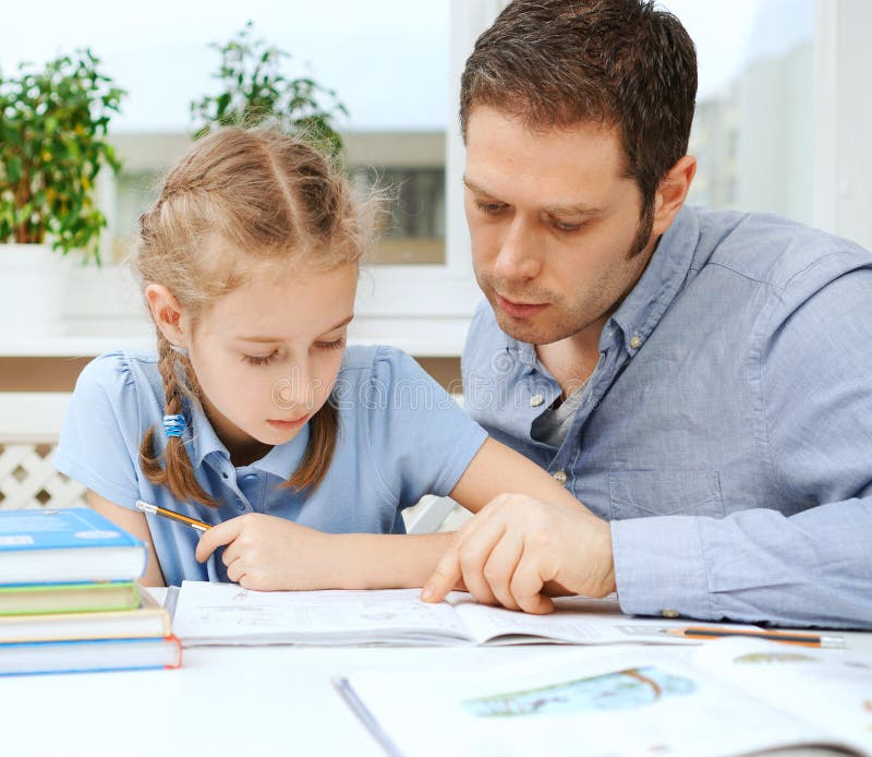 Father helping daughter. stock photo. Image of learning - 105018046