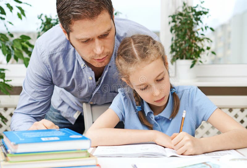 Father Helping Daughter with Homework. Stock Image - Image of parenting ...