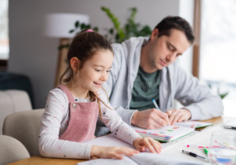 Father Helping Daugther with Homework Indoors at Home, Distance ...