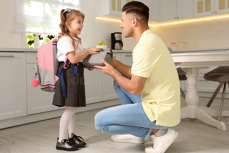 Father Helping His Little Child Get Ready for School in Kitchen Stock ...